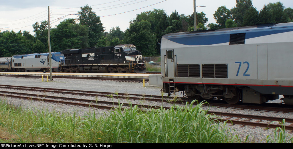 NS 7695 on the train from Roanoke about to surrender its place to AMTK 72